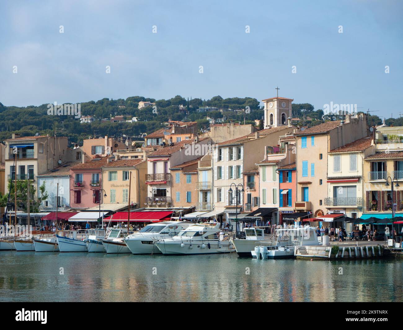 Cassis, France - May 18th 2022: Boats moored in the old harbour in ...