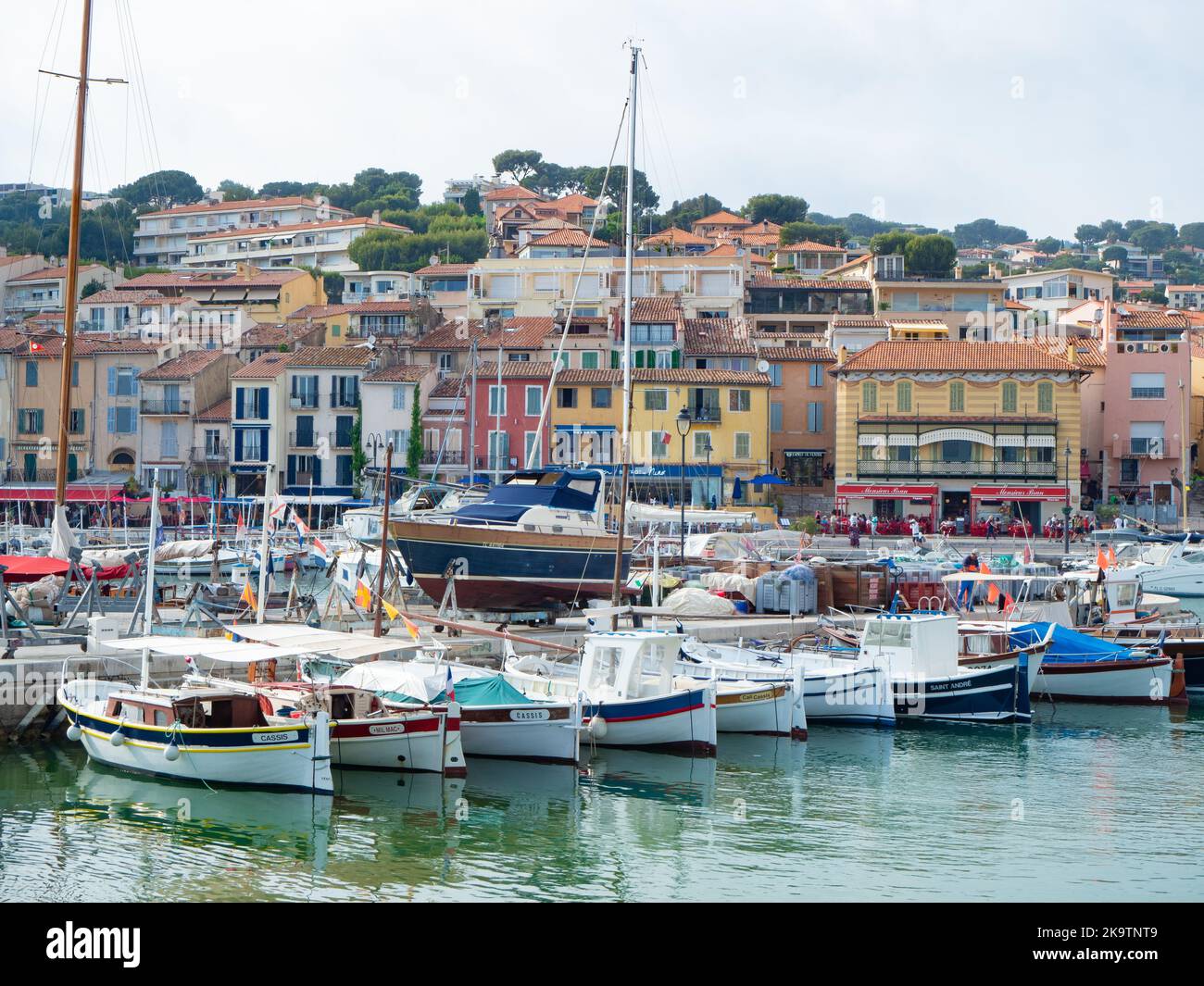 Cassis, France - May 18th 2022: Old fishing boats in the harbour in ...