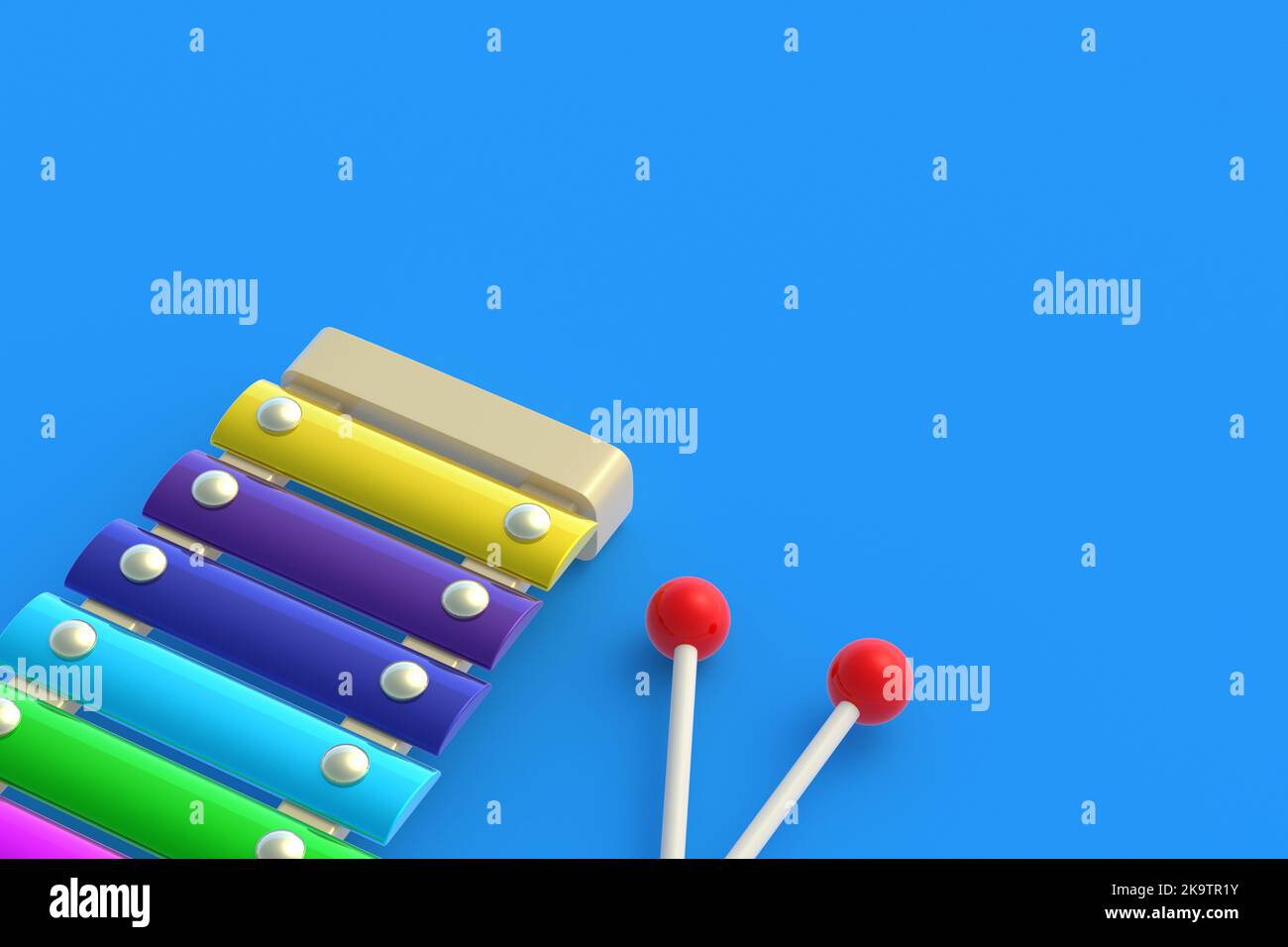 Colorful xylophone on blue background. Kids toy. Preschool education. Musical instrument. Funny ...