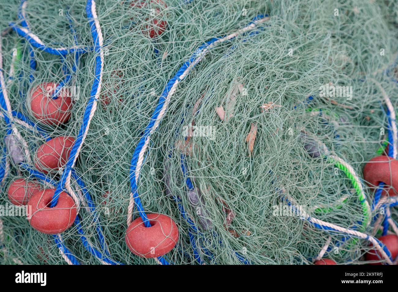 Green fishing net, ropes and floats, Cyprus Stock Photo - Alamy