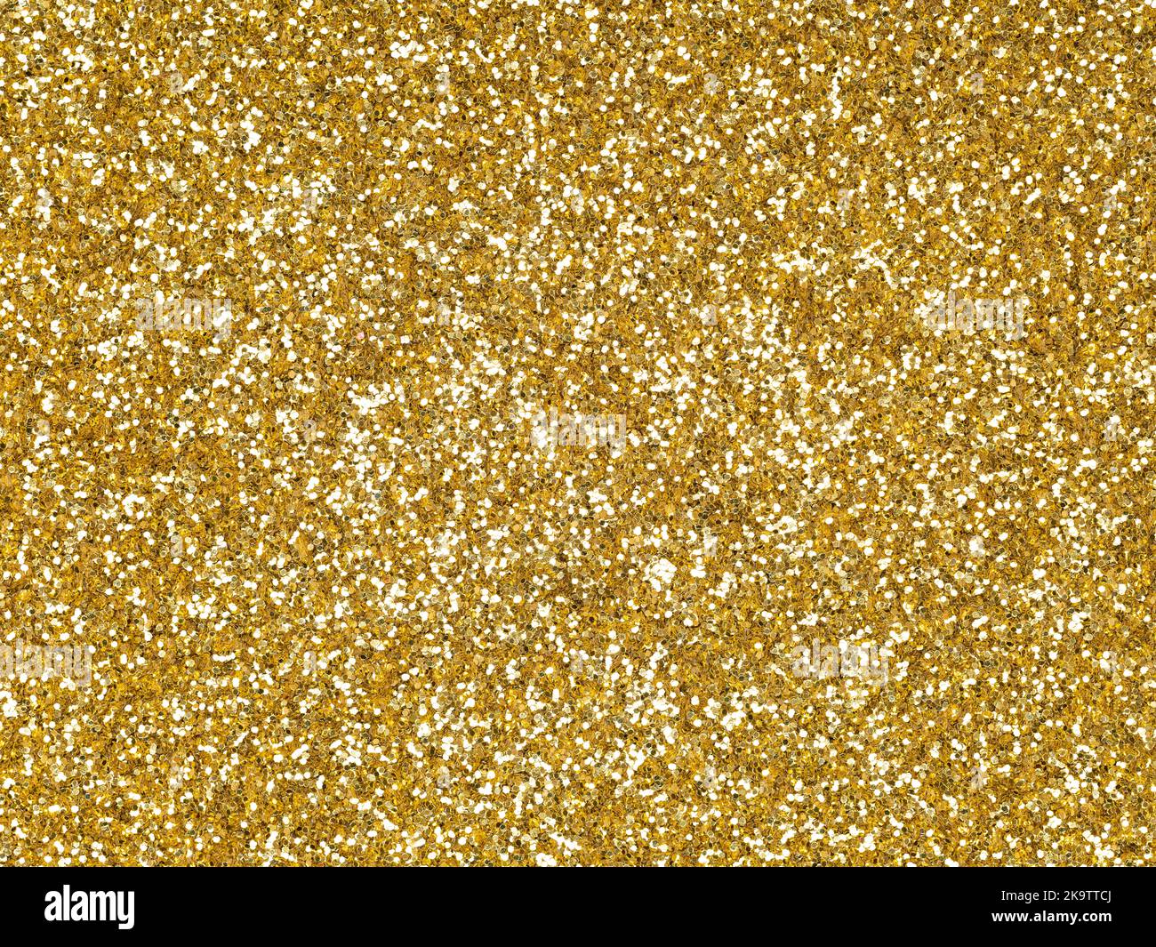 Gold glitter texture closeup. Saturated shiny holographic background ...
