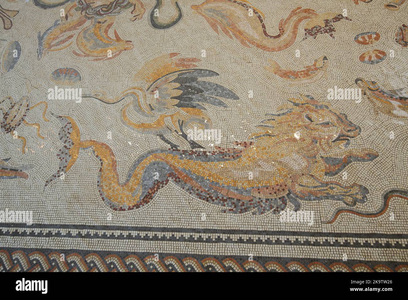 Floor mosaic in the Roman mosaic in the spa garden, lion figure, yellow ...