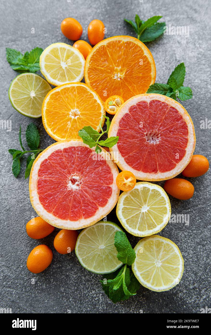 Fresh summer fruits on a concrete background Stock Photo - Alamy
