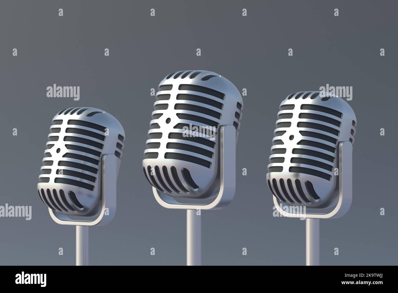 Vintage metallic microphones on gray background. Radio broadcast ...