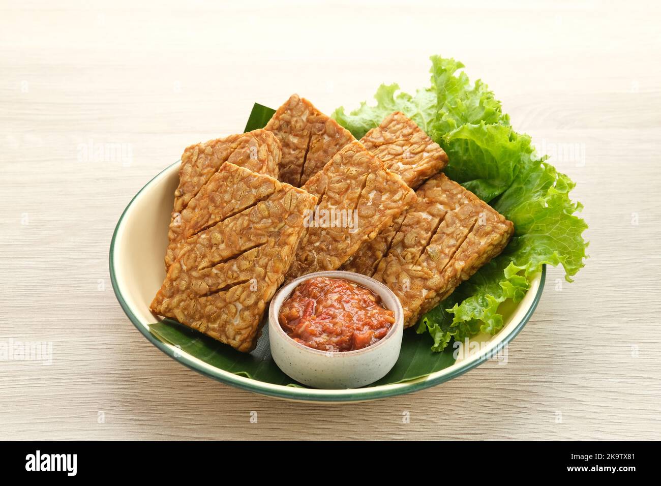 Tempeh, Tempe Goreng or Fried tempeh is Indonesia traditional food, made from fermented soybean ...