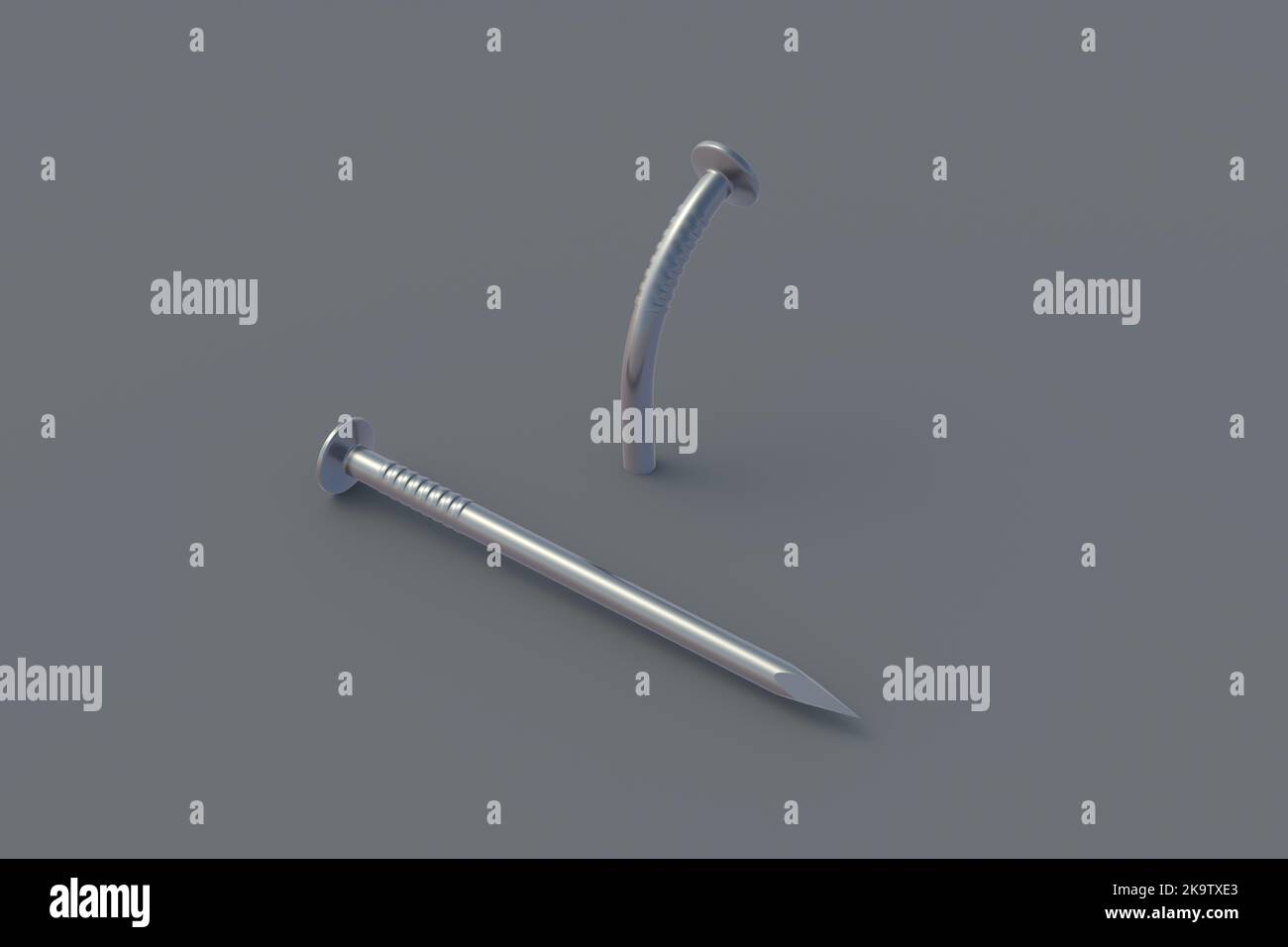 Curved metal nail on gray background. Building equipment. Tool for ...