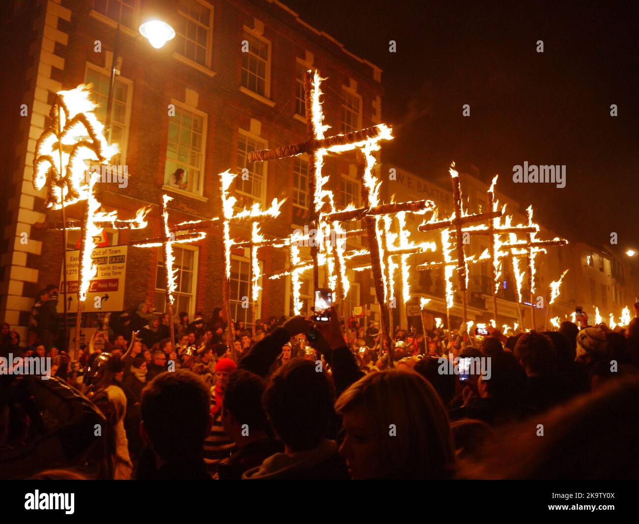 The seventeen martyrs crosses processing past School Hill House in ...