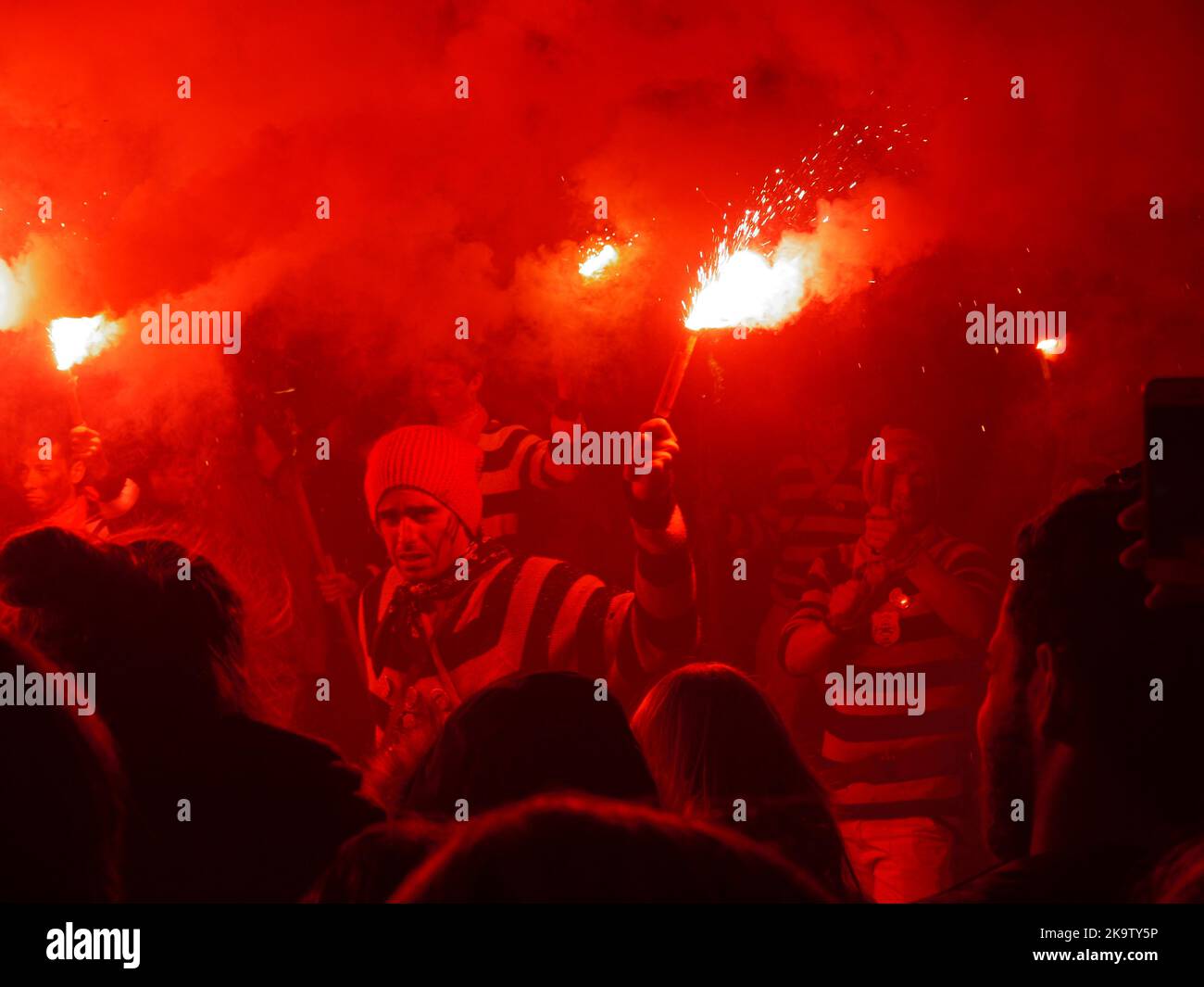 Smugglers of the Cliffe Bonfire Society illuminated by torchlight at ...