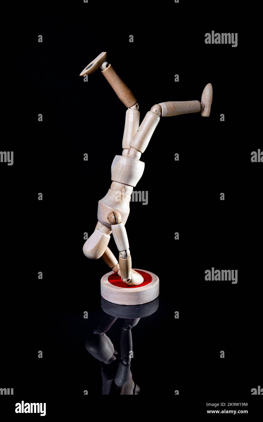 Image of falling wooden manikin on black background, wooden manikin ...