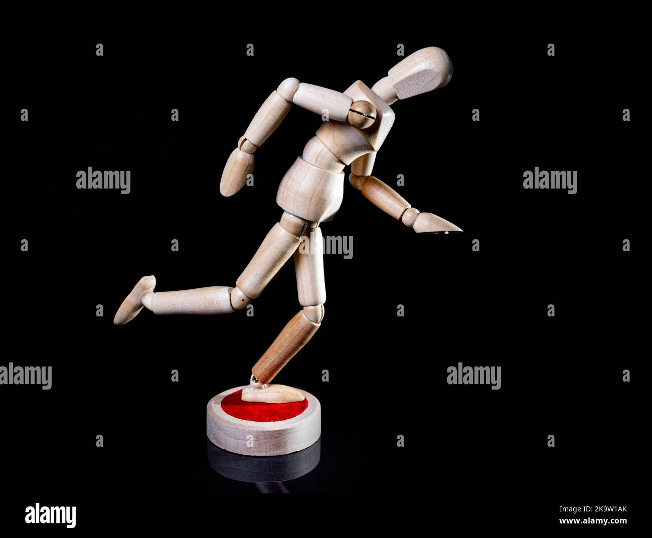 Image of falling wooden manikin on black background, wooden manikin ...