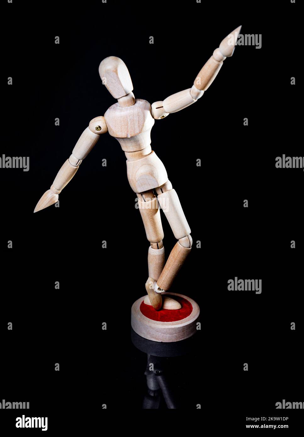 Image of falling wooden manikin on black background, wooden manikin ...