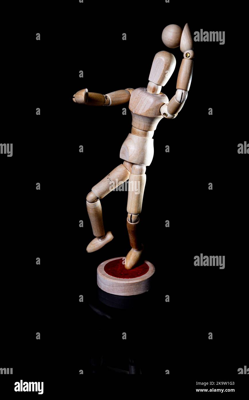 Image of falling wooden manikin on black background, wooden manikin ...