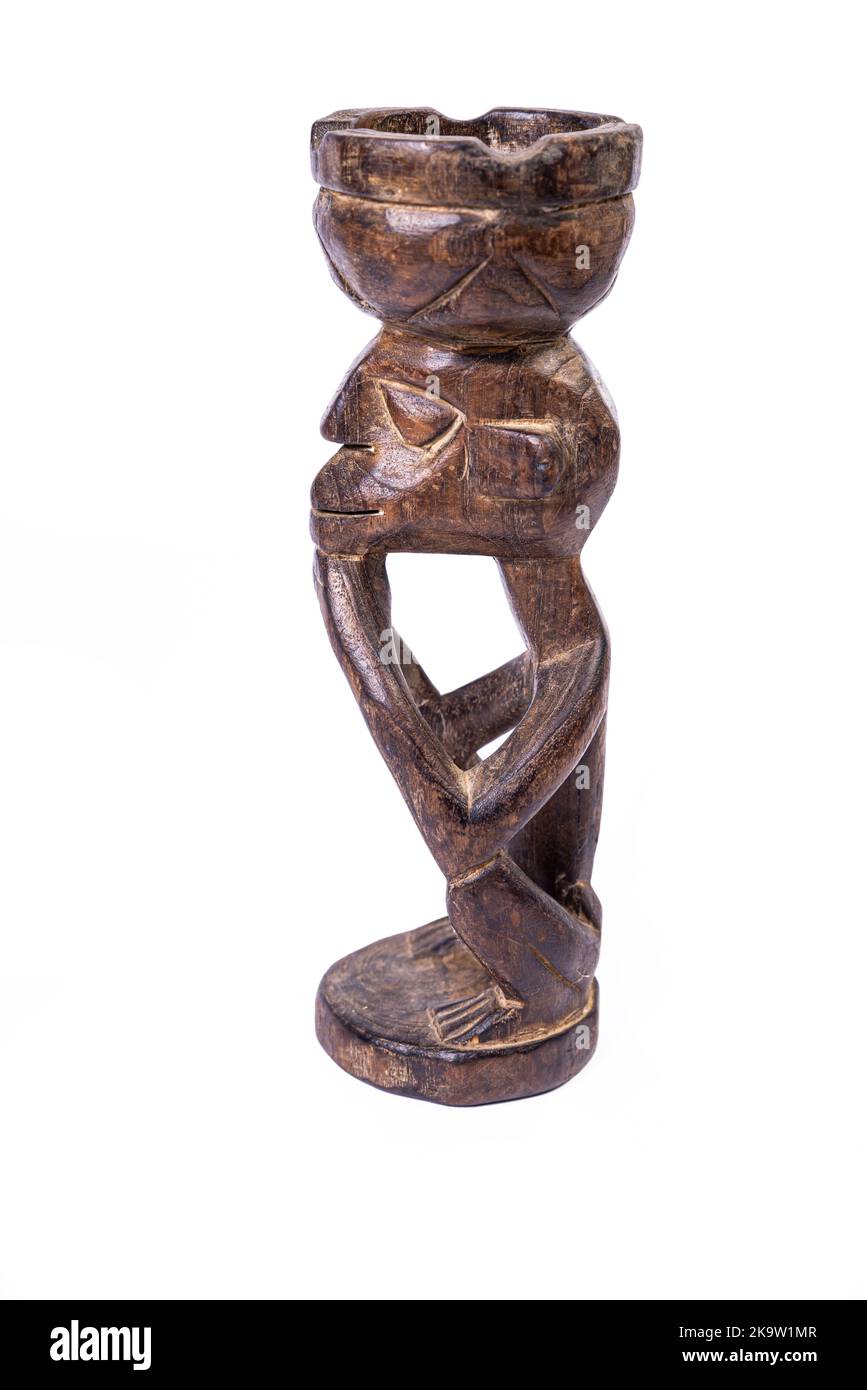 Wooden African male figure, isolated on white background with space for ...