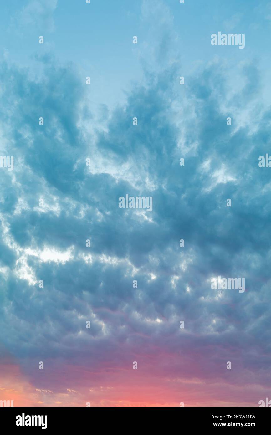 Blue dusk sky with clouds and ocean. Horizon. Azure heaven. Vertical ...