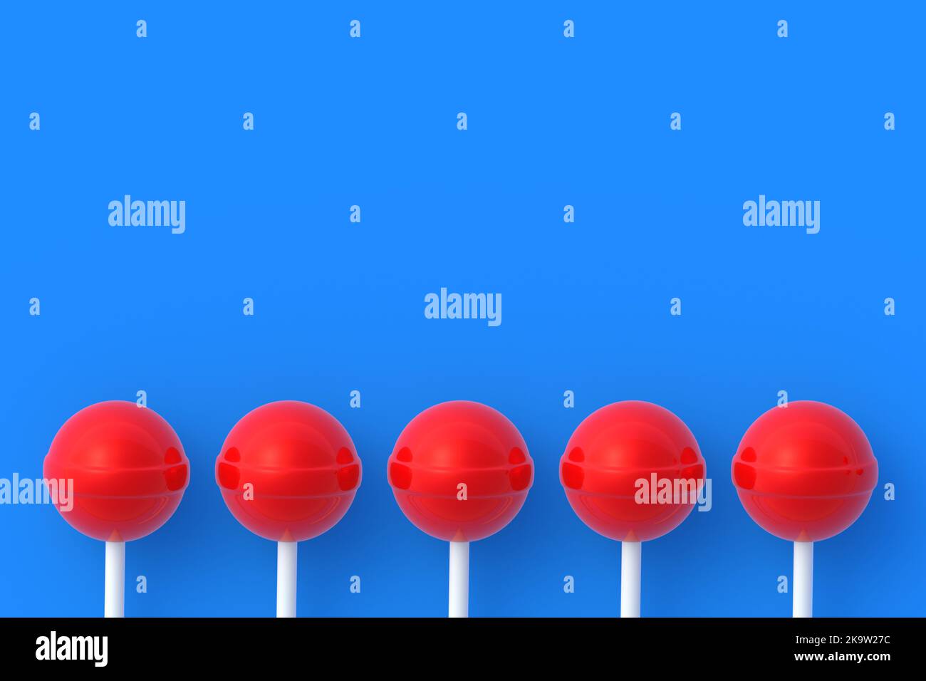 Row of lollipops on stick on blue background. Sweet candy ...