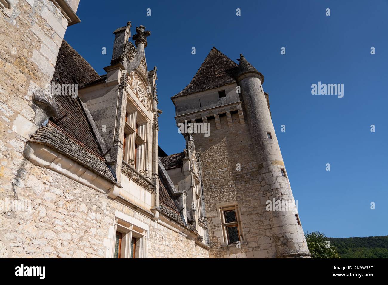 a medieval hand-built stone built chateau under blue summer sky Stock ...