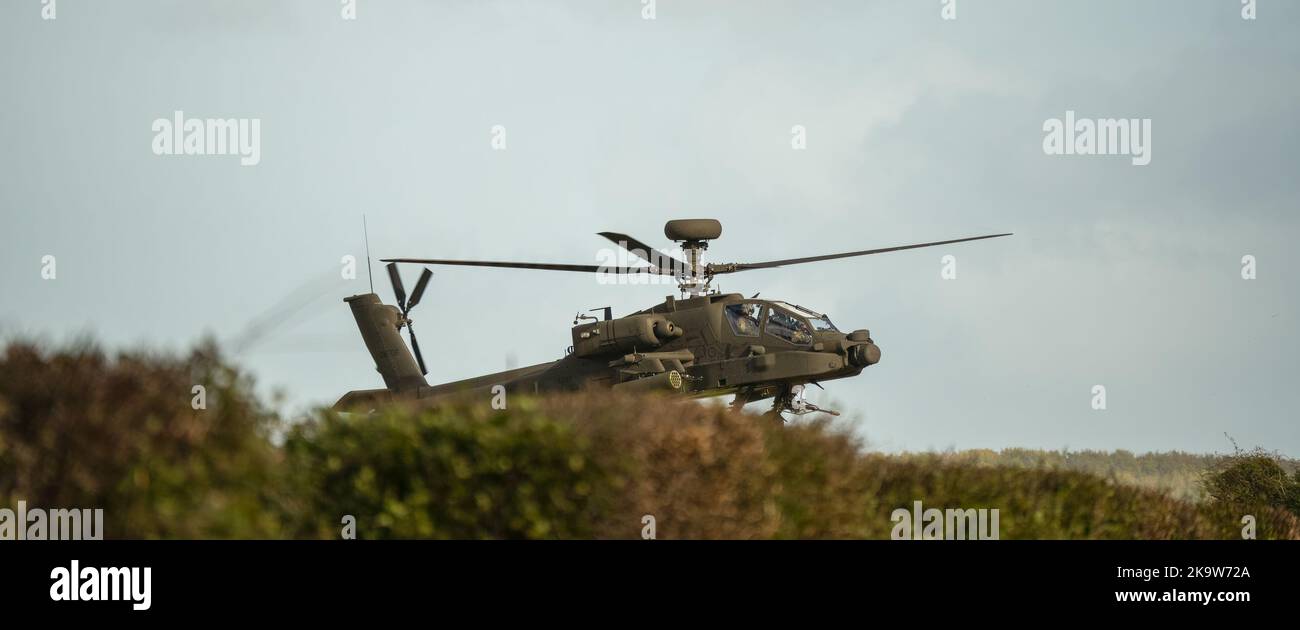 close-up head-on view of a British army Boeing Apache Attack helicopter ...
