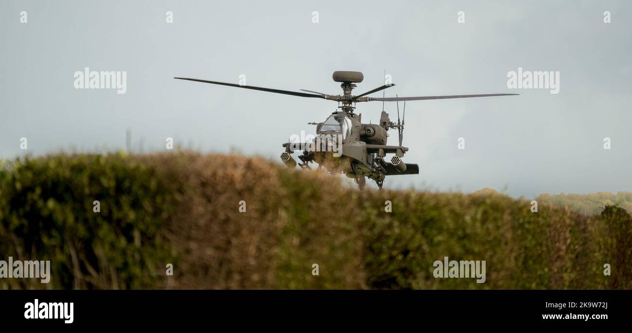 close-up head-on view of a British army Boeing Apache Attack helicopter ...