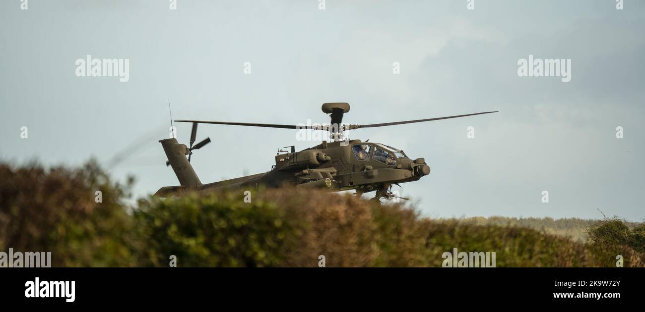 close-up head-on view of a British army Boeing Apache Attack helicopter ...