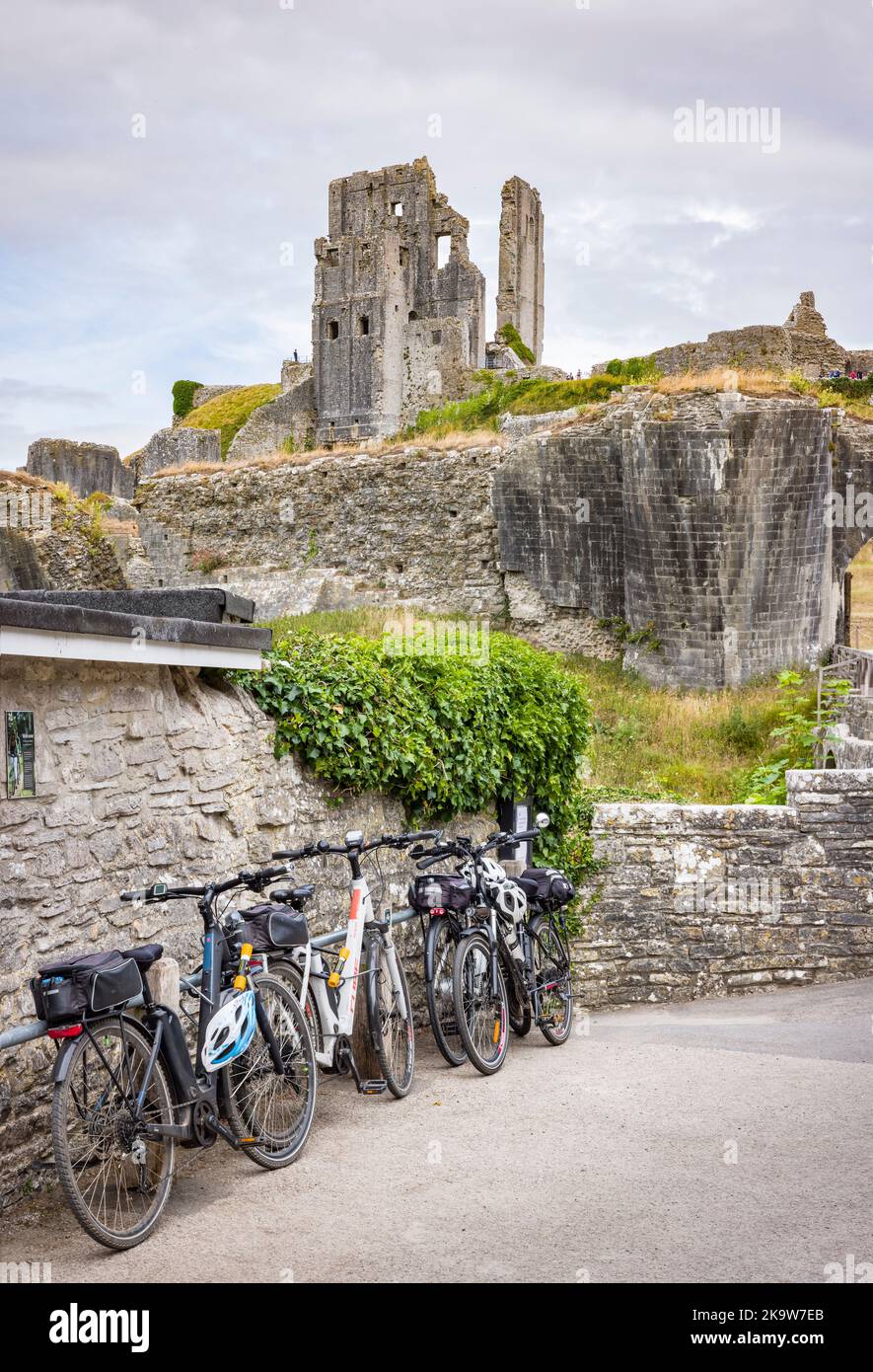 DORSET, UK - July 06, 2022. Touring bikes parked outside Corfe Castle ...