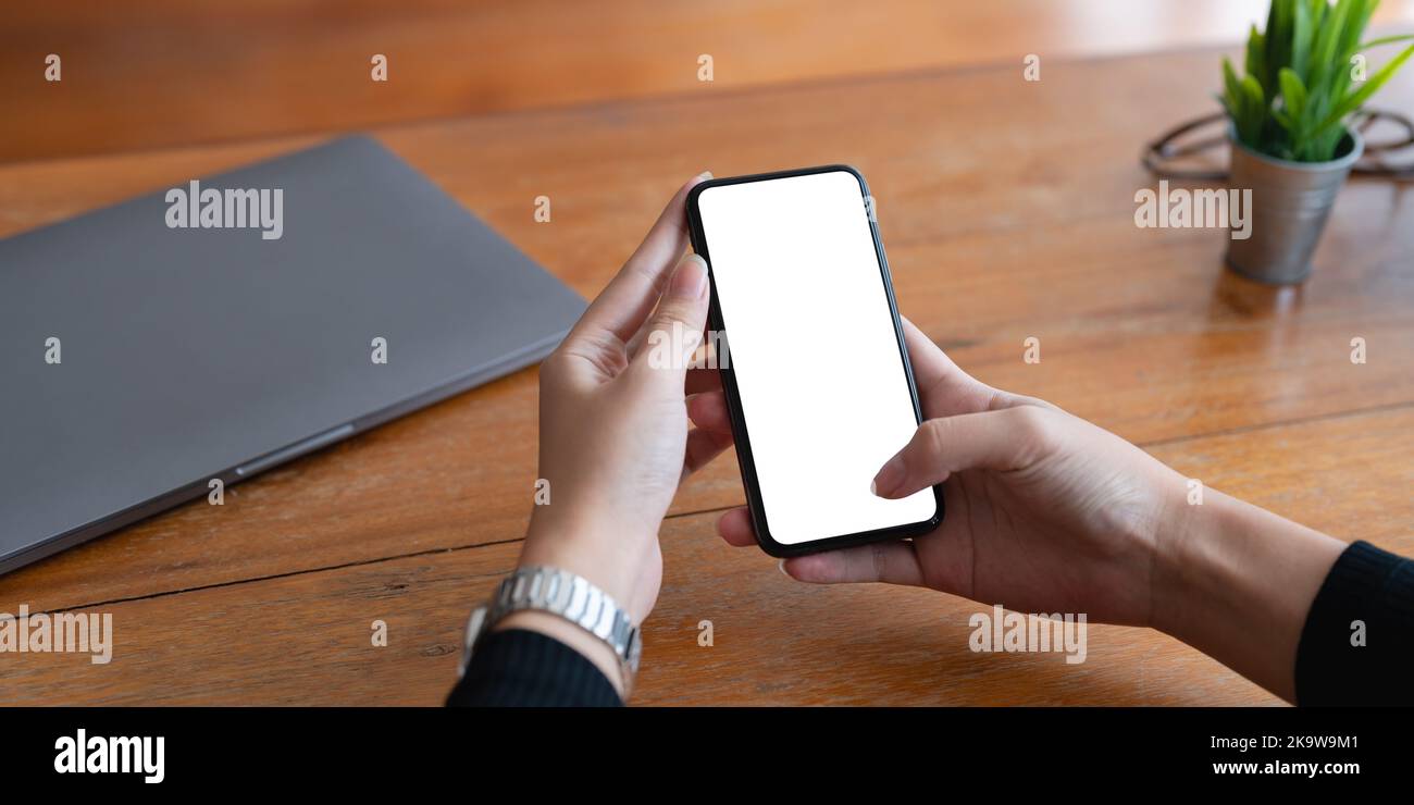 Woman Hand Holding Smartphone With Blur Bokeh Blank Screen Mobile
