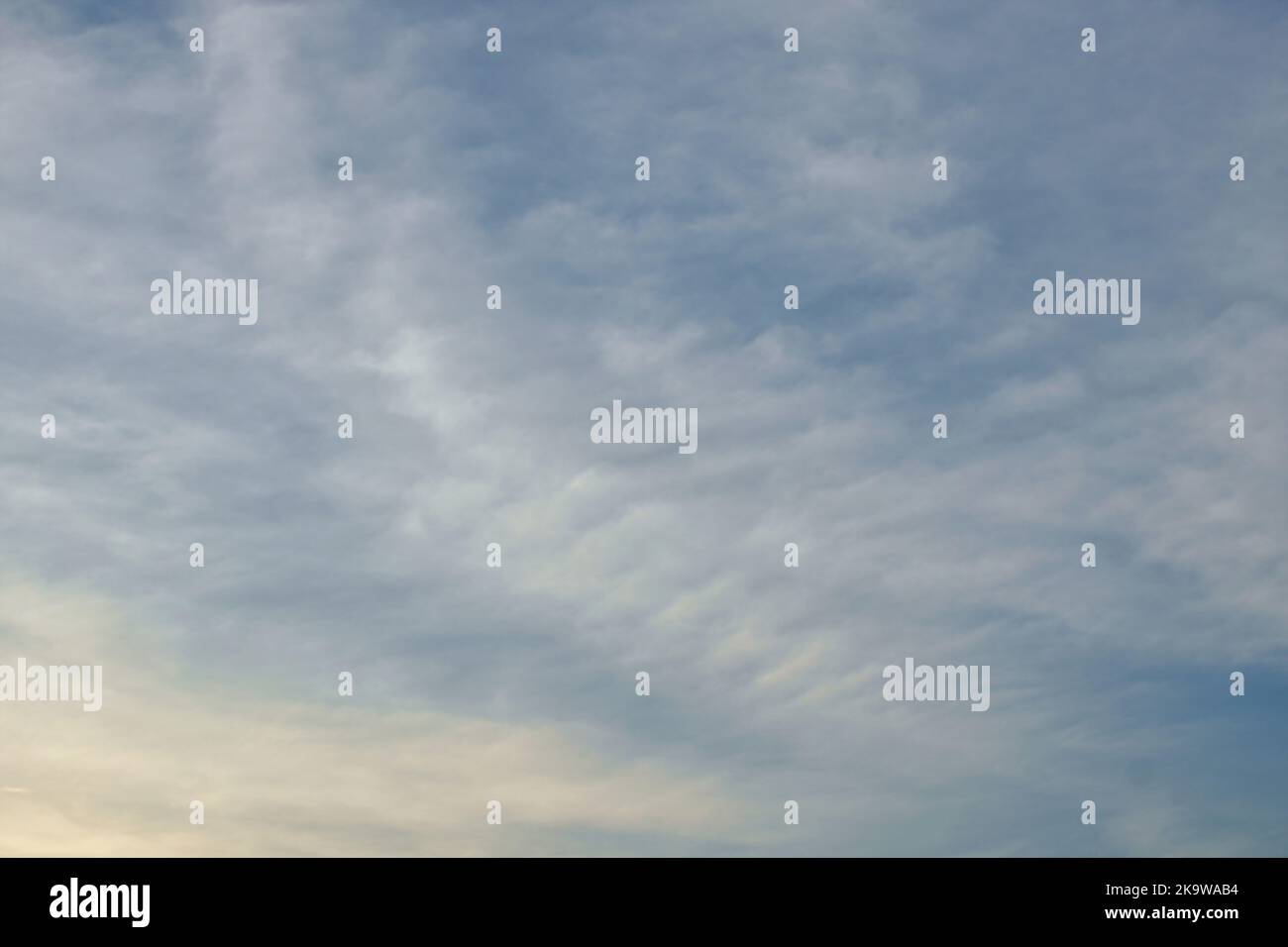 cloud spreading on sunset twilight sky in evening Stock Photo - Alamy