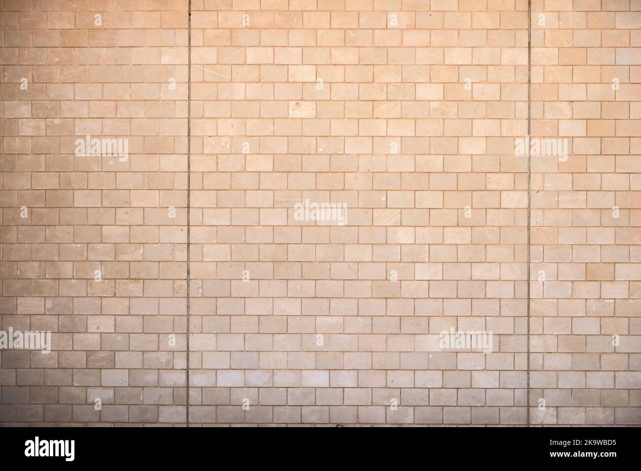 a yellow Brick wall background. Stone wall background Stock Photo - Alamy