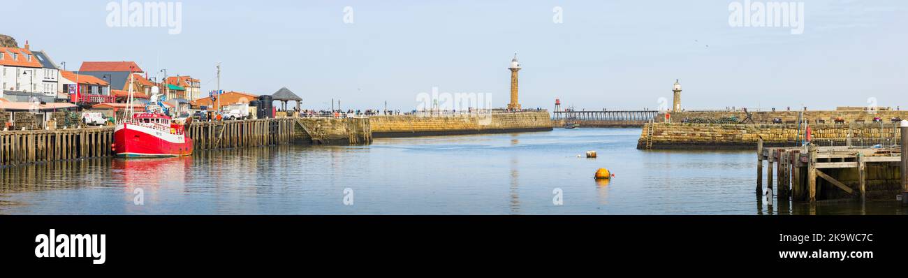 WHITBY, UK - September 21, 2022. Panoramic of Whitby harbour with ...