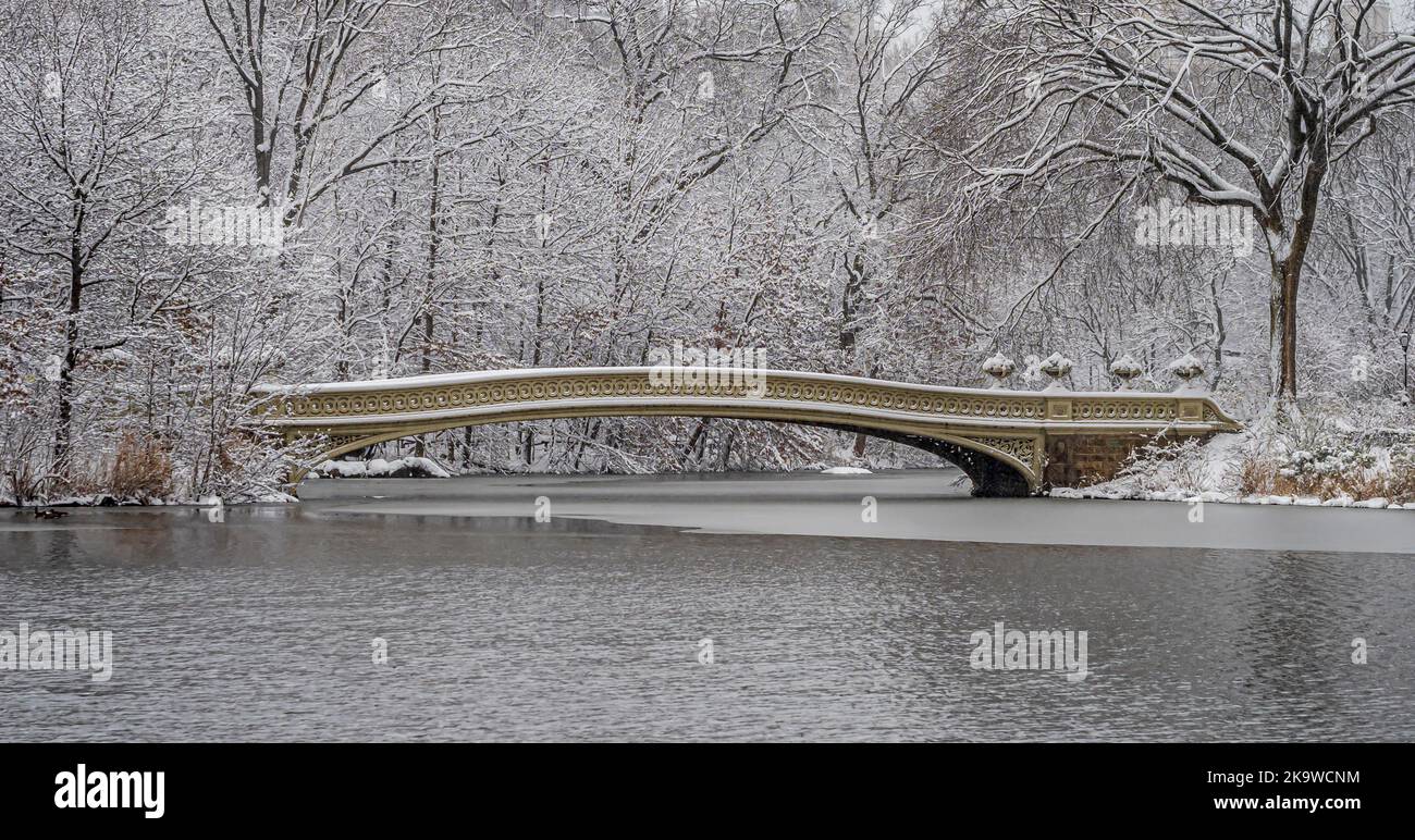 Bow bridge, Central Park, New York City during snow storm, or blizzard ...