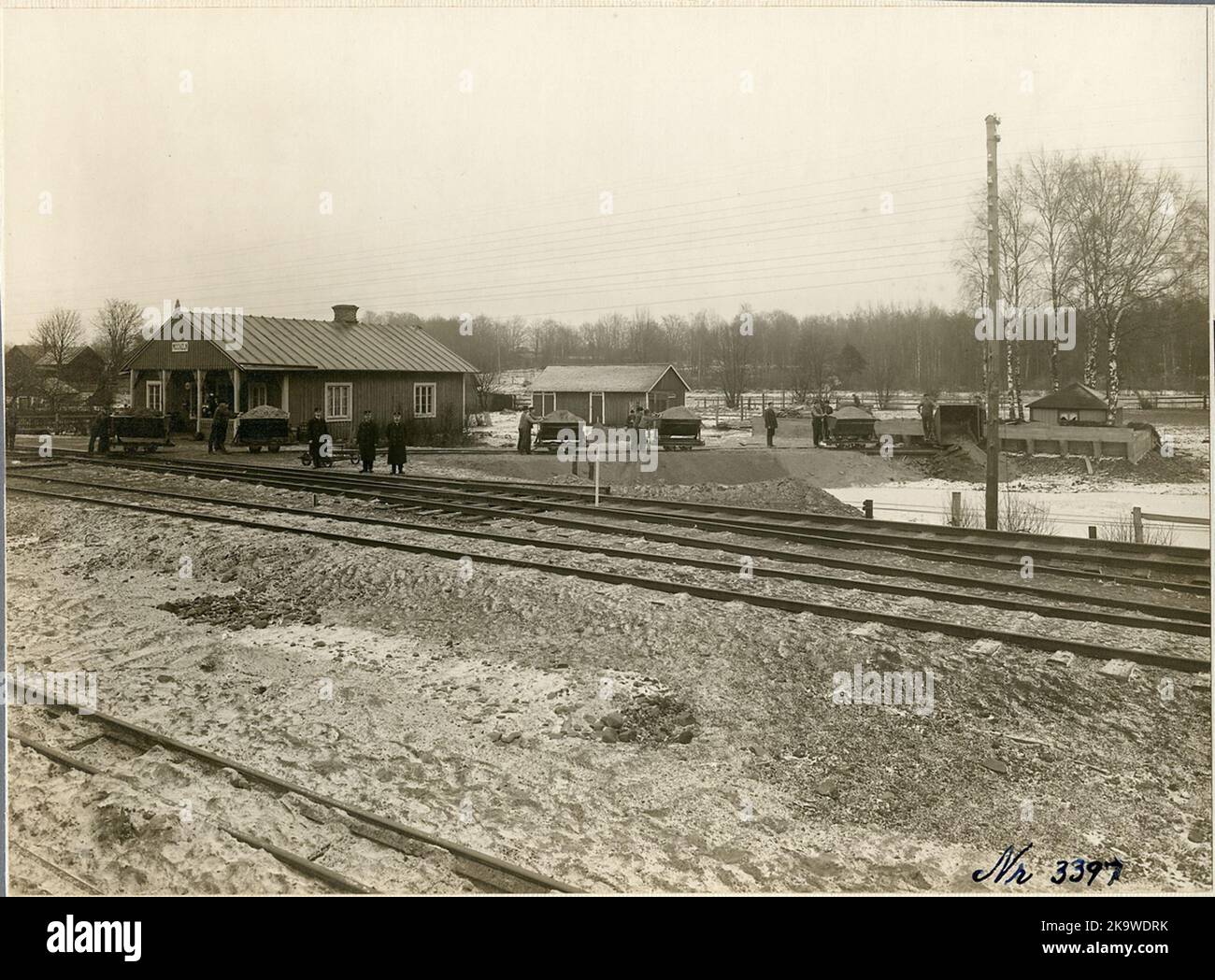 Filling work for plan in front of a new station house Stock Photo - Alamy