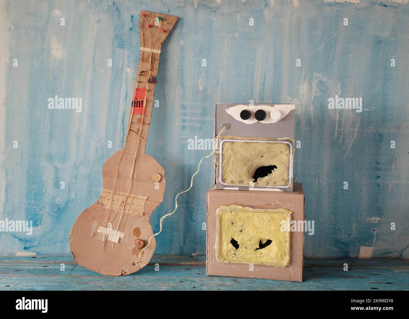Grungy cardboard model of a guitar and an amp stack,music, live ...