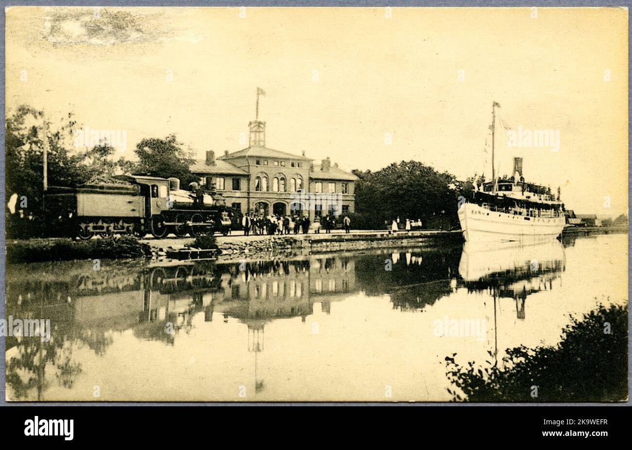 Steam locomotive at Töreboda Railway Station and S/S Juno in the Göta ...