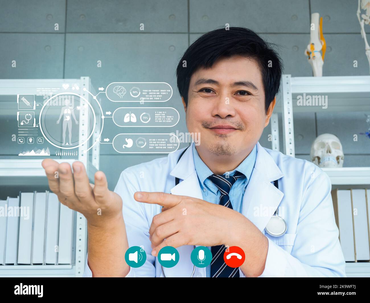 Asian man doctor explaining about functioning of the internal organs ...