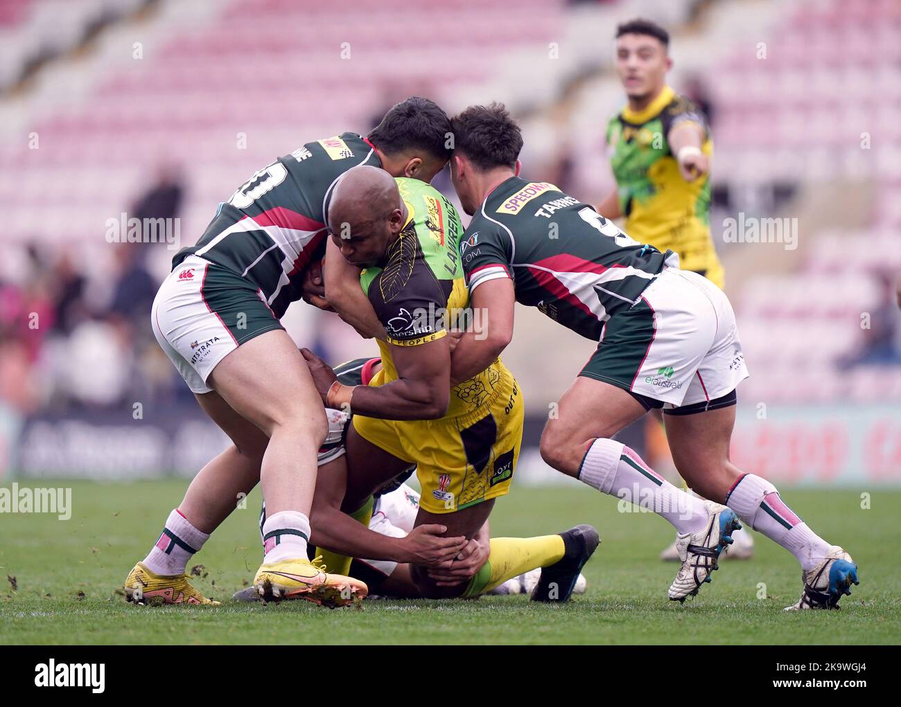 Lebanon’s Jaxson Rahme (left) and Michael Tannous (right) tackle ...