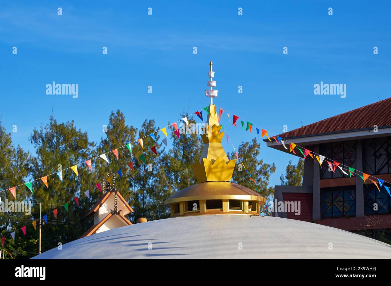 Colorful flag of Buddhism at the golden pagoda Stock Photo - Alamy