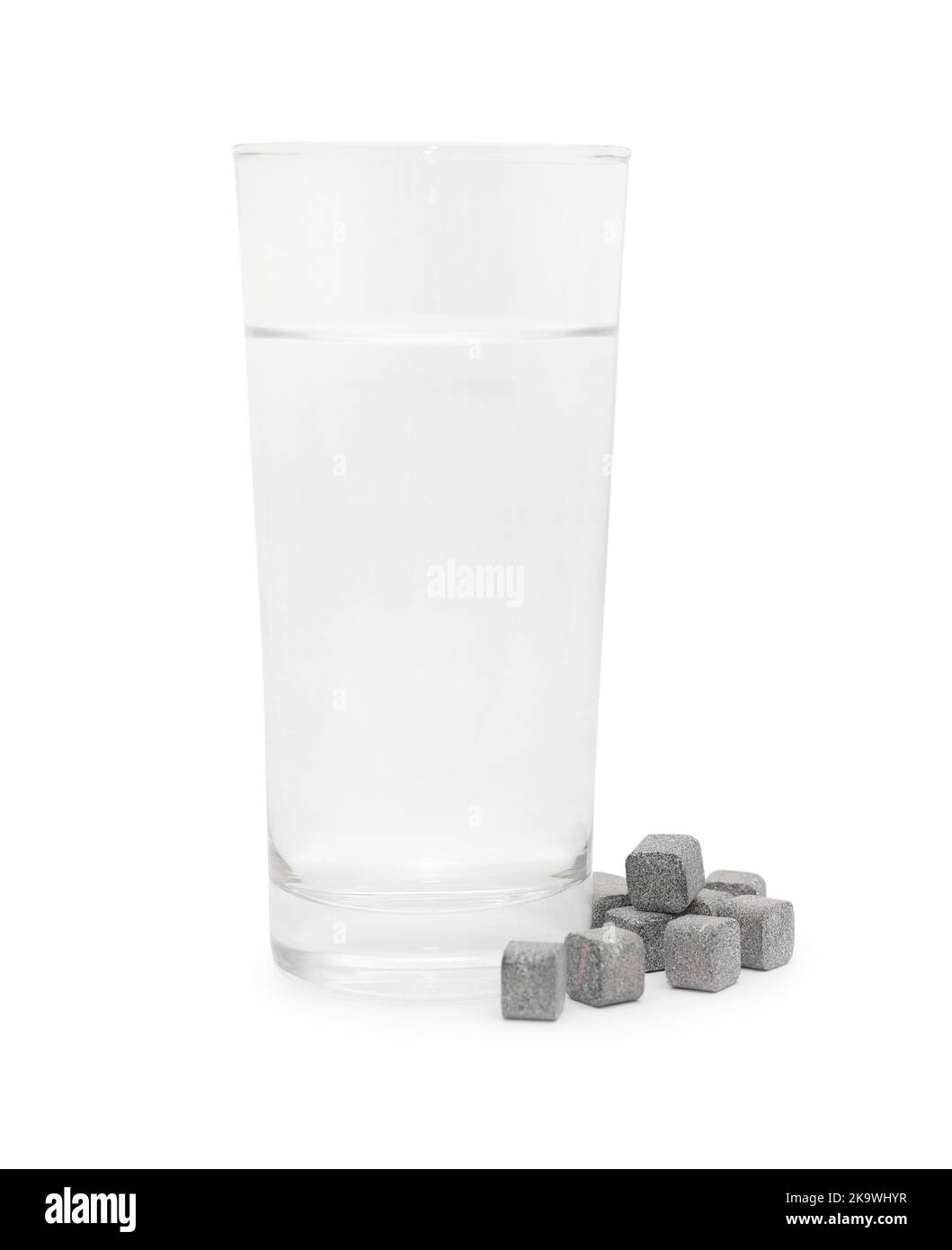 Glass of water with soluble tablets on white background Stock Photo - Alamy