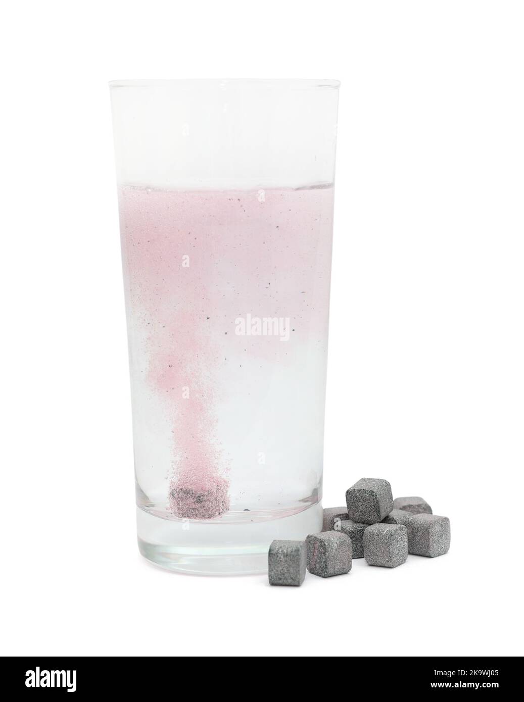 Glass of water with soluble tablets on white background Stock Photo - Alamy