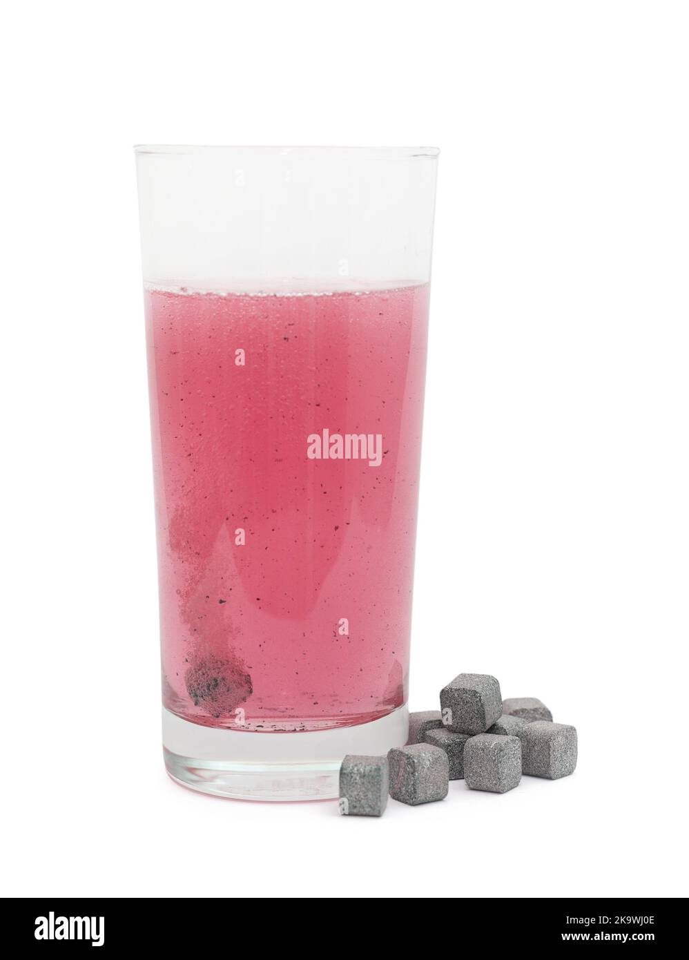 Glass of water with soluble tablets on white background Stock Photo - Alamy