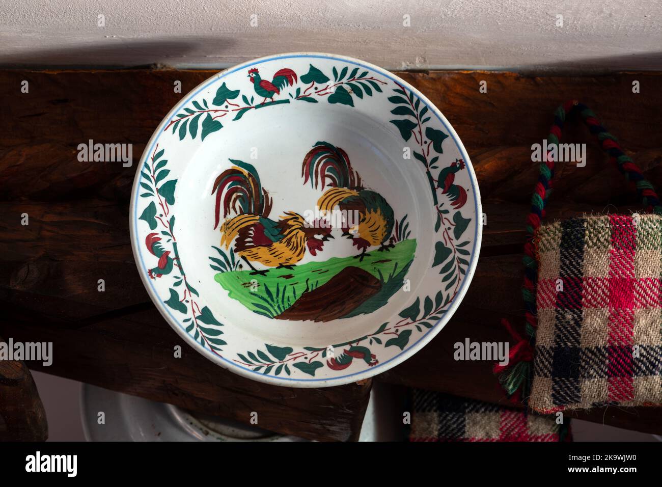 A vintage traditional handmade pottery plate from Romania displayed on ...
