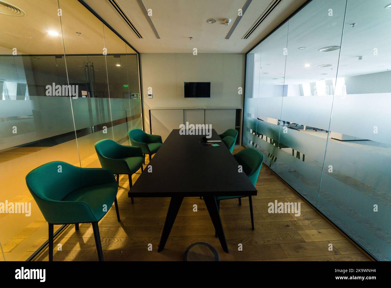 Meeting zone in the office in a loft style with white brick walls and ...