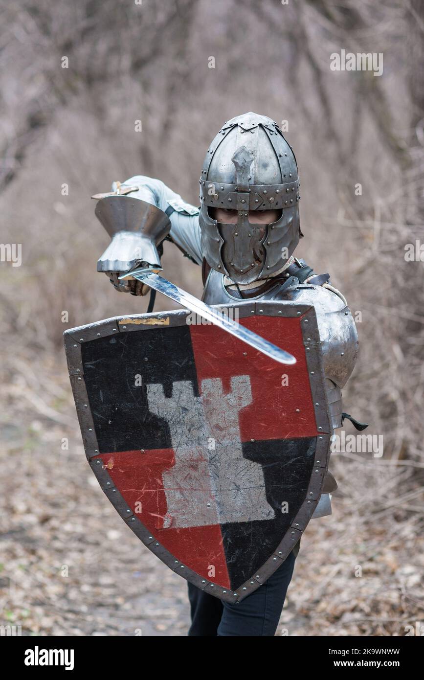 Noble warrior. Portrait of one medeival warrior or knight in armor and ...