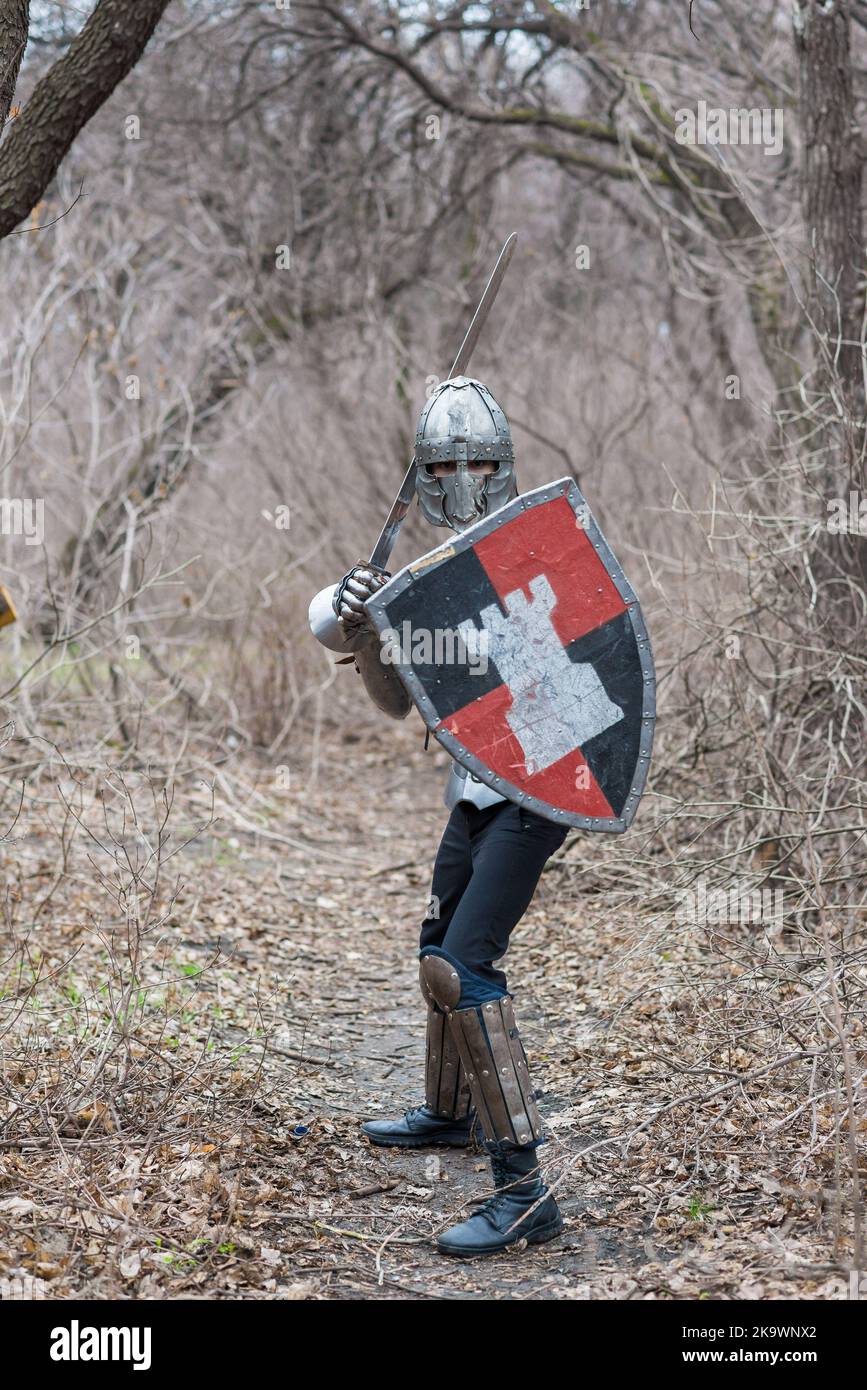 Noble warrior. Portrait of one medeival warrior or knight in armor and ...