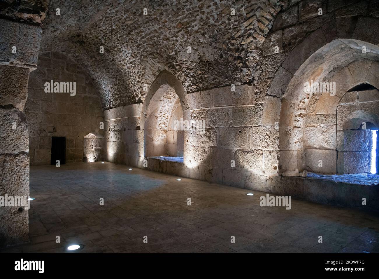 Large room with vaulted ceiling and two arrow slits 12th century Ajloun ...