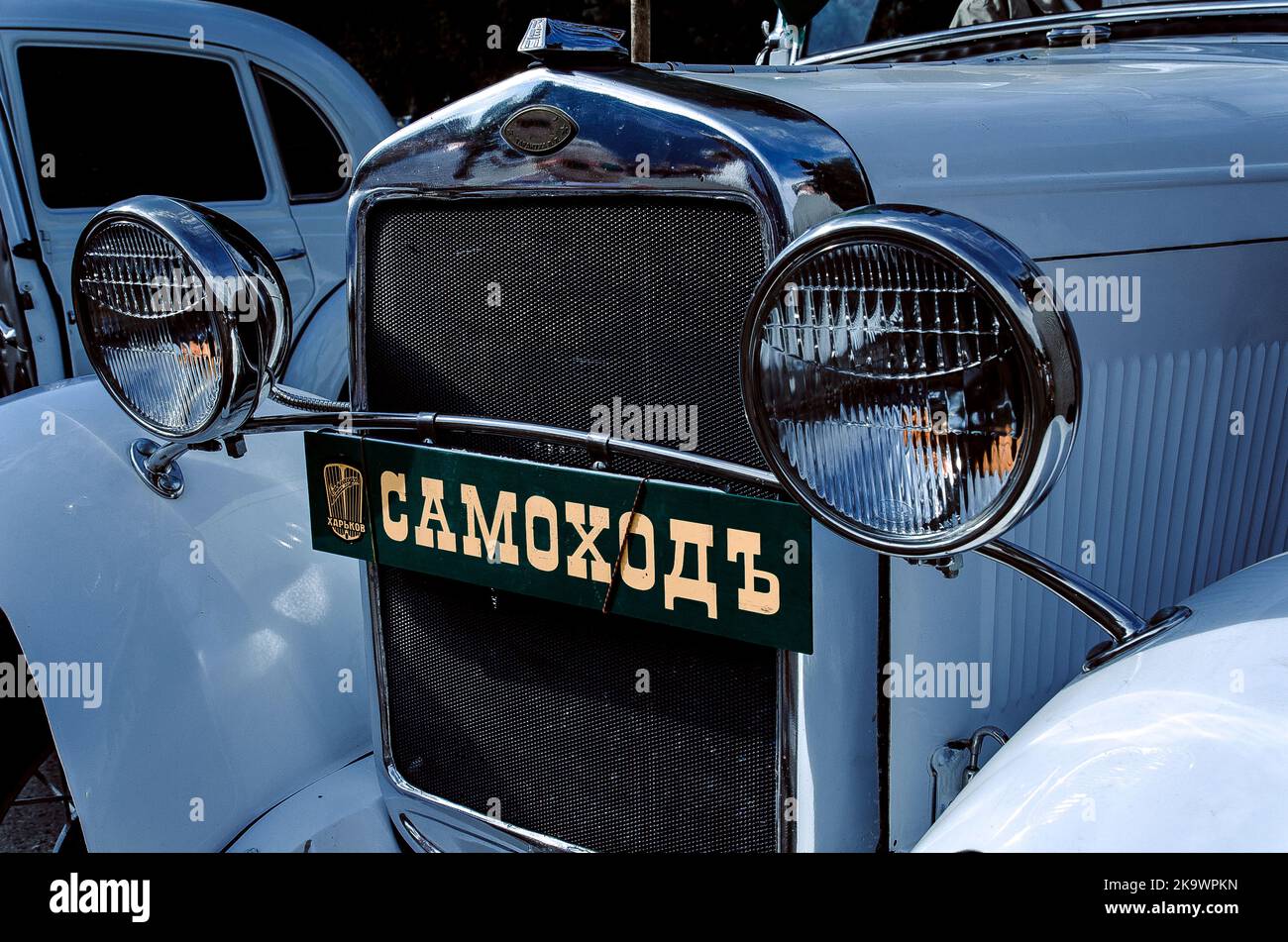 Color detail on the headlight of a vintage car, retro car dashboard ...