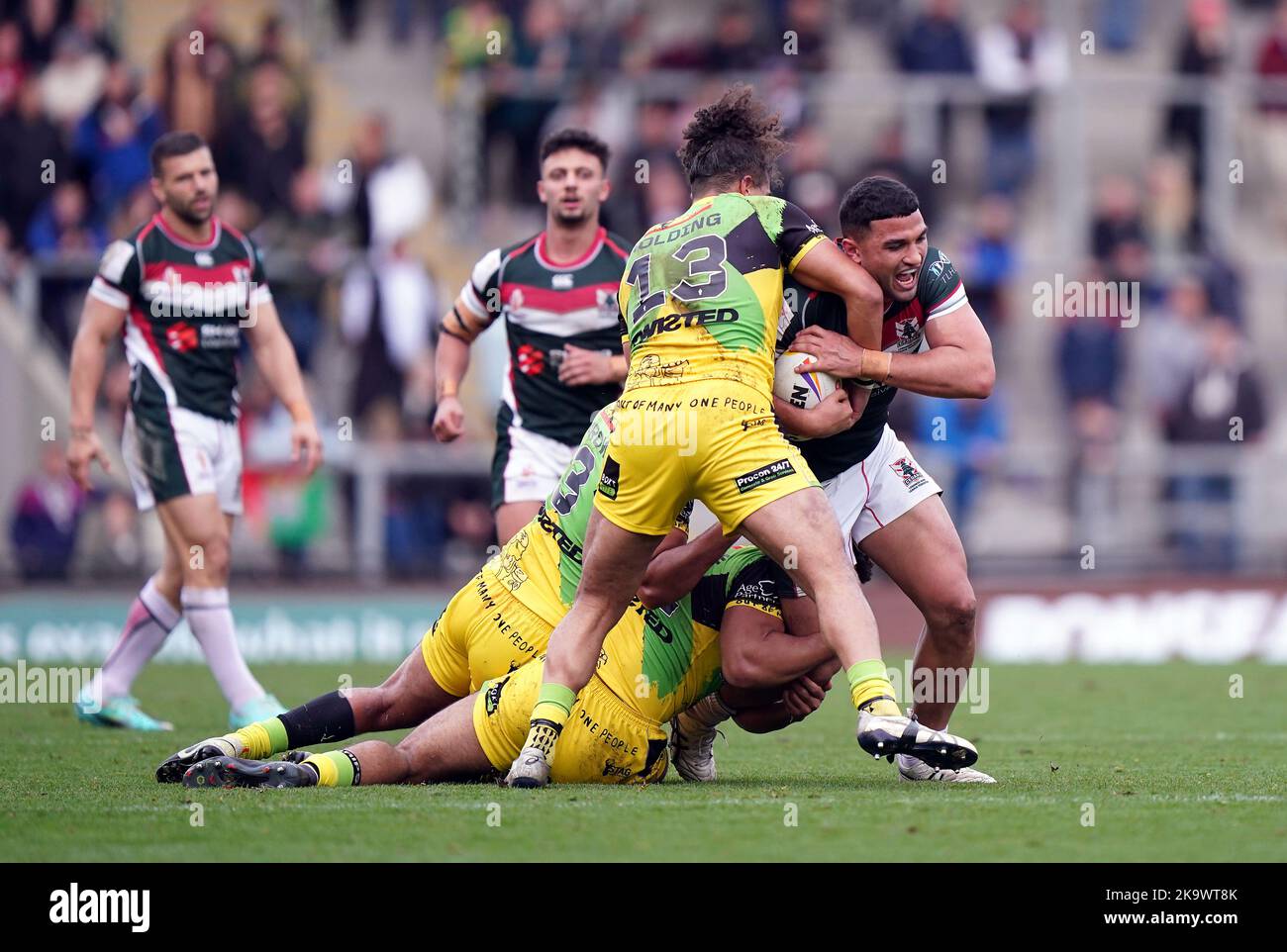 Lebanon’s Elie El-Zakham is tackled by Jamaica’s Ashton Golding during ...