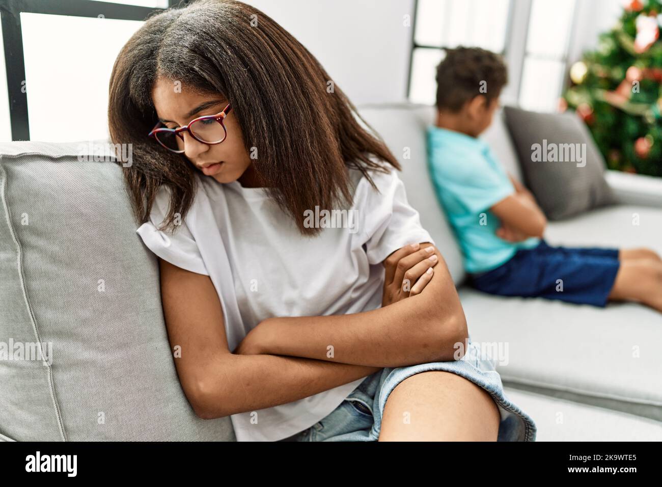 Brother and sister angry having problem sitting on sofa at home Stock ...