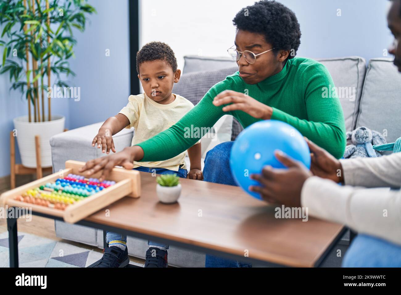 African american family playing with abacus at home Stock Photo - Alamy