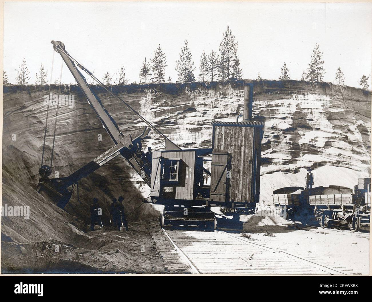 Gravel roof with a steam -driven excavator Stock Photo - Alamy