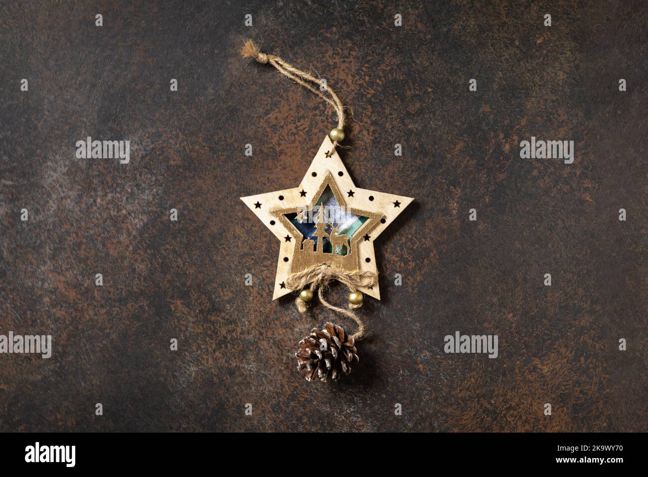 Christmas brown stone background with Christmas gold decor star. View ...