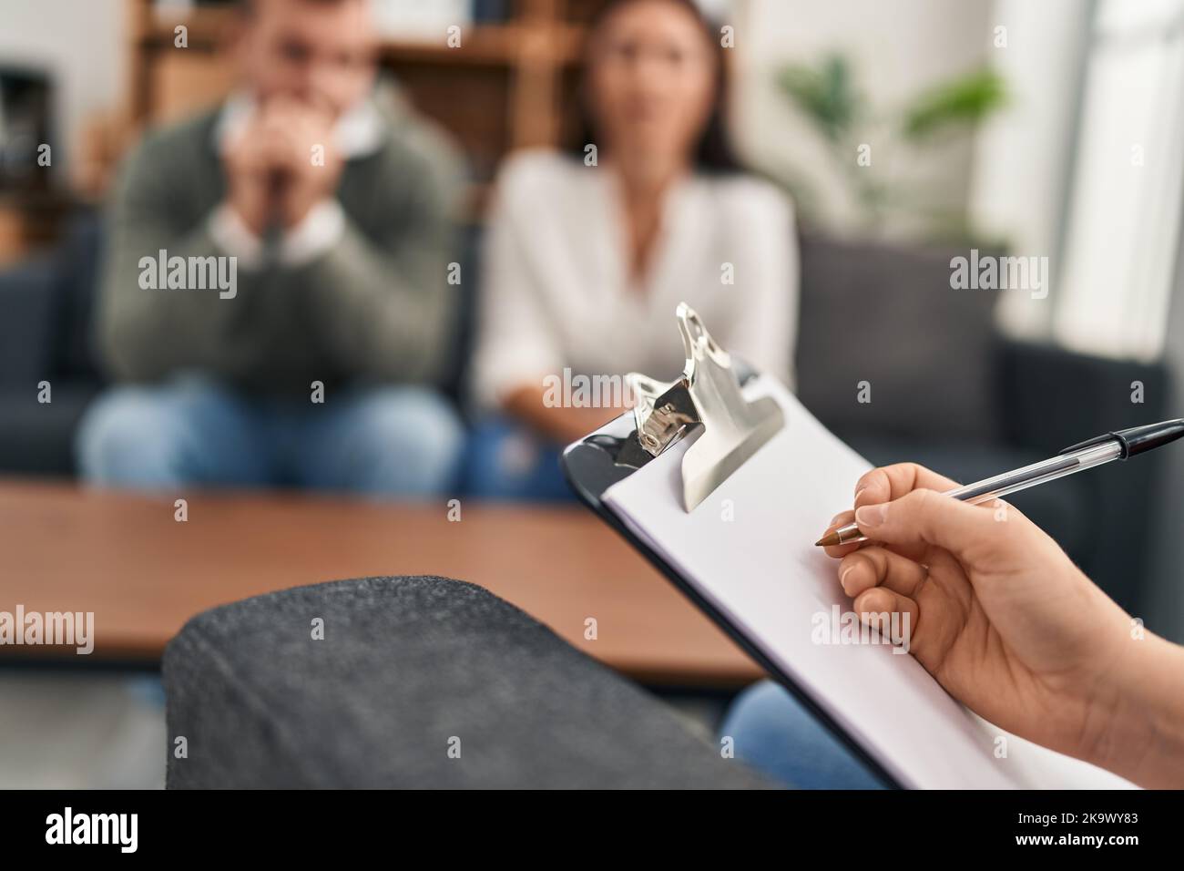 Man and woman having couple therapy session at psychology clinic Stock ...